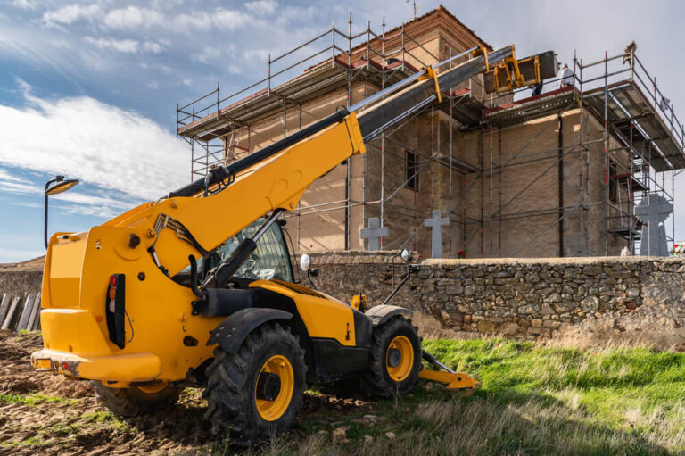 How a Boom Loader Boosts Efficiency on Construction Sites